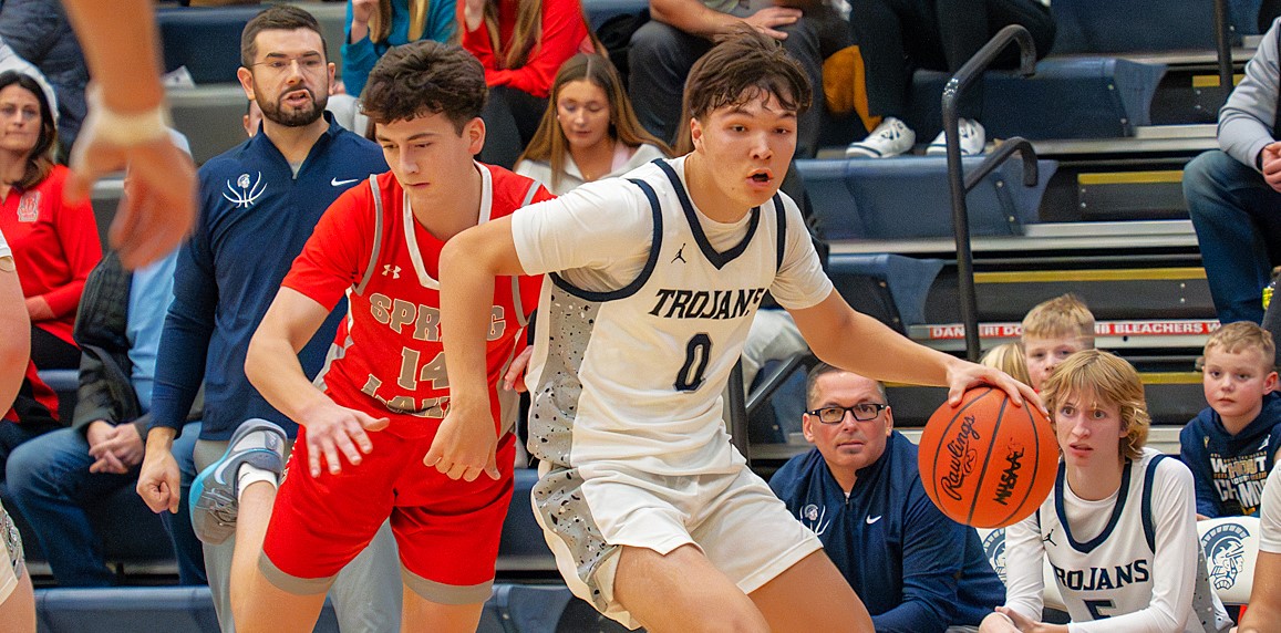 Fruitport boys basketball team hangs on to beat rival Spring Lake for ...